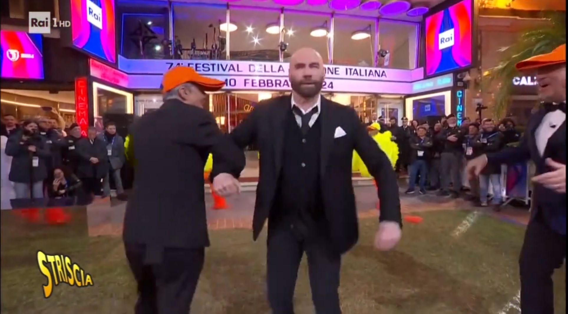 Sanremo, Il ballo del qua qua di Travolta era sponsorizzato? - Striscia ...